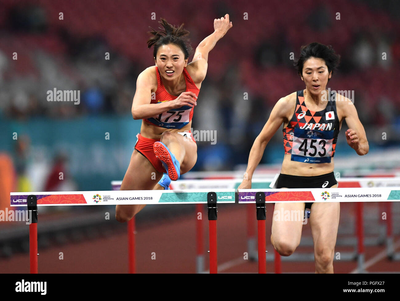 Jakarta. 26th Aug, 2018. Wang Dou (L) of China competes during the ...