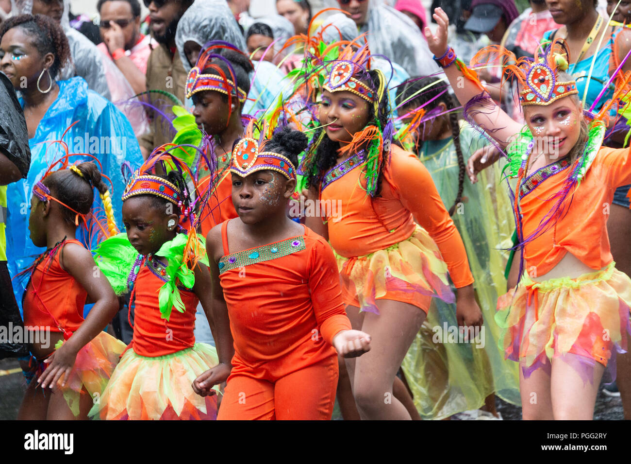 London, Britain. 26th Aug, 2018. Performers take part in the Children's ...
