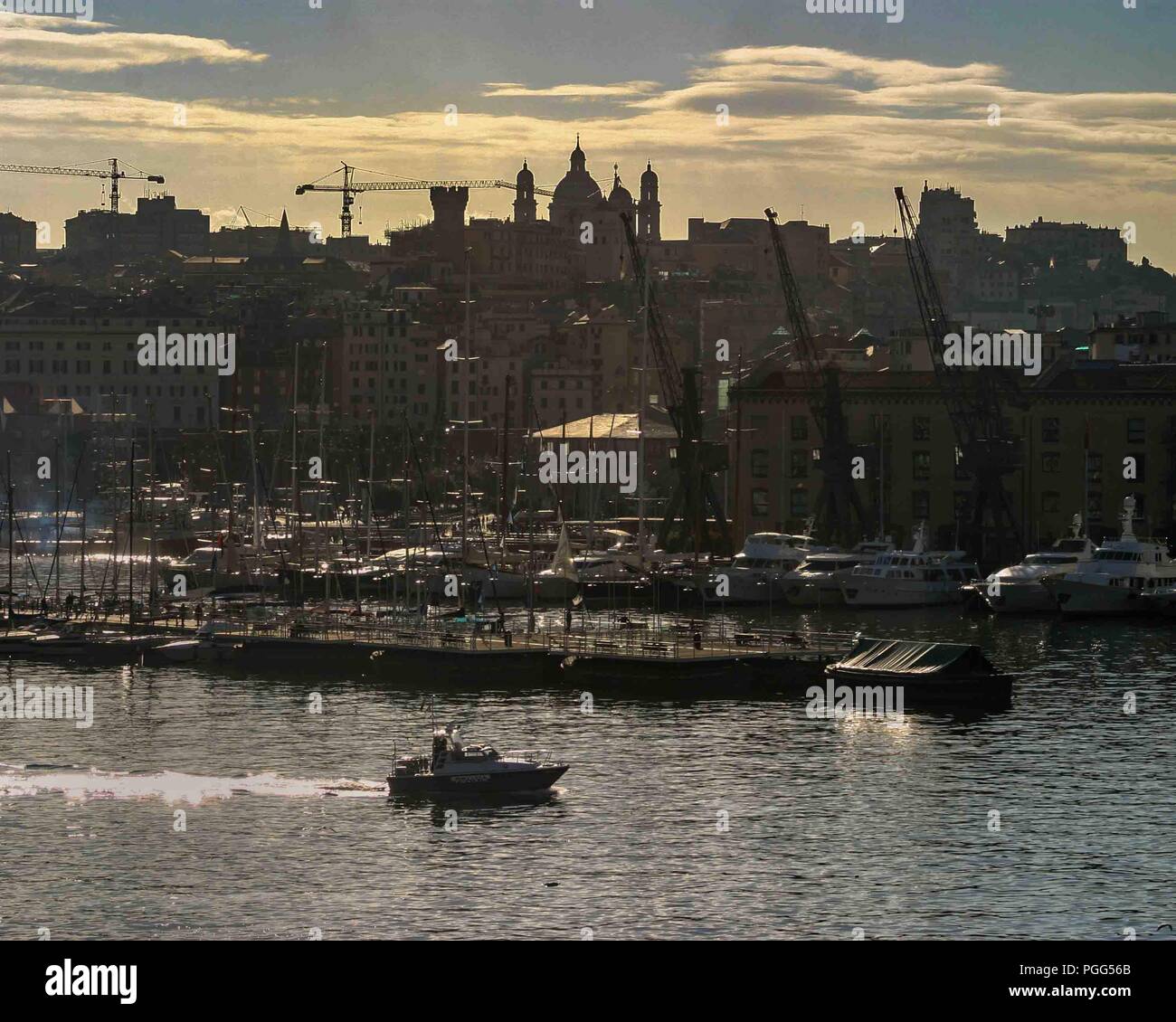 Genoa, Liguria, Italy. 16th Oct, 2004. A police boat patrols the harbor ...