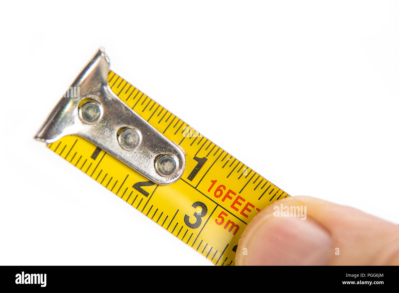 Carpentry tape meter closeup on a white Stock Photo - Alamy
