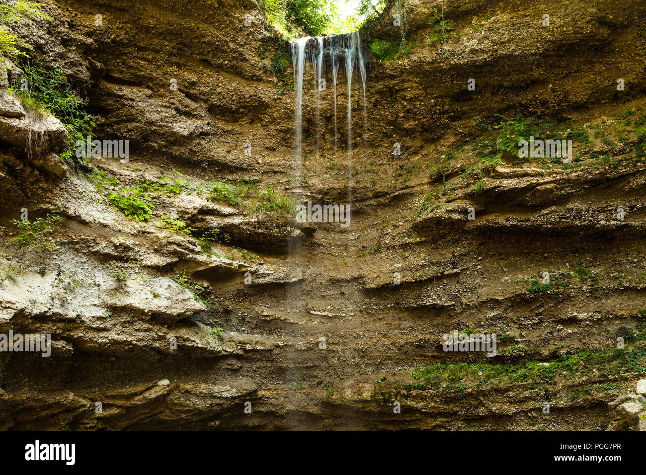 Mysterious Waterfall Deep In The Forest Stock Photo - Alamy