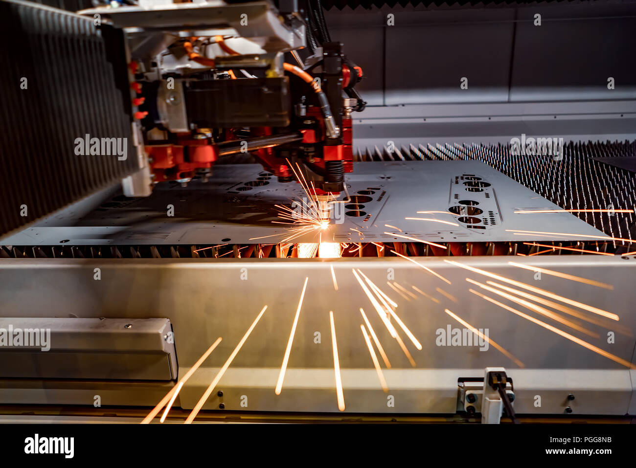 CNC Laser cutting of metal, modern industrial technology. Small depth ...