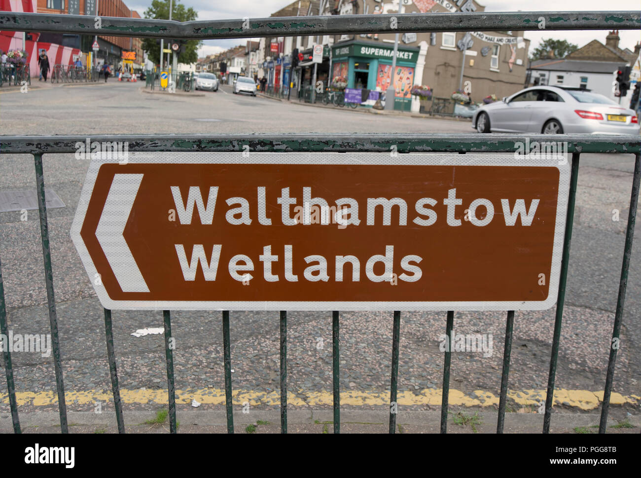 left pointing sign for walthamstow wetlands, in walthammstow, london ...