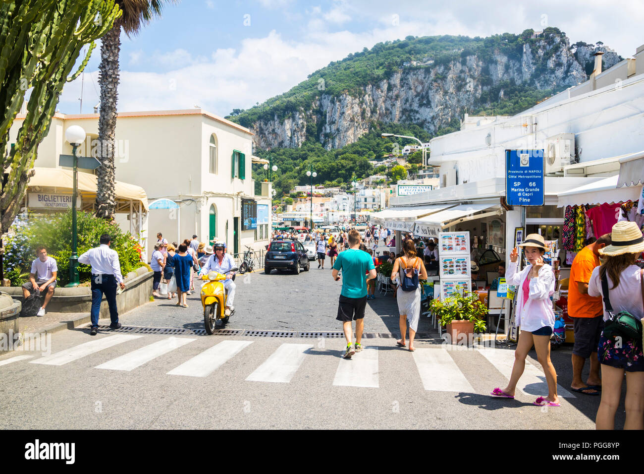 Tourists walking Marina Grande, port, Capri Island, Italy, high summer ...