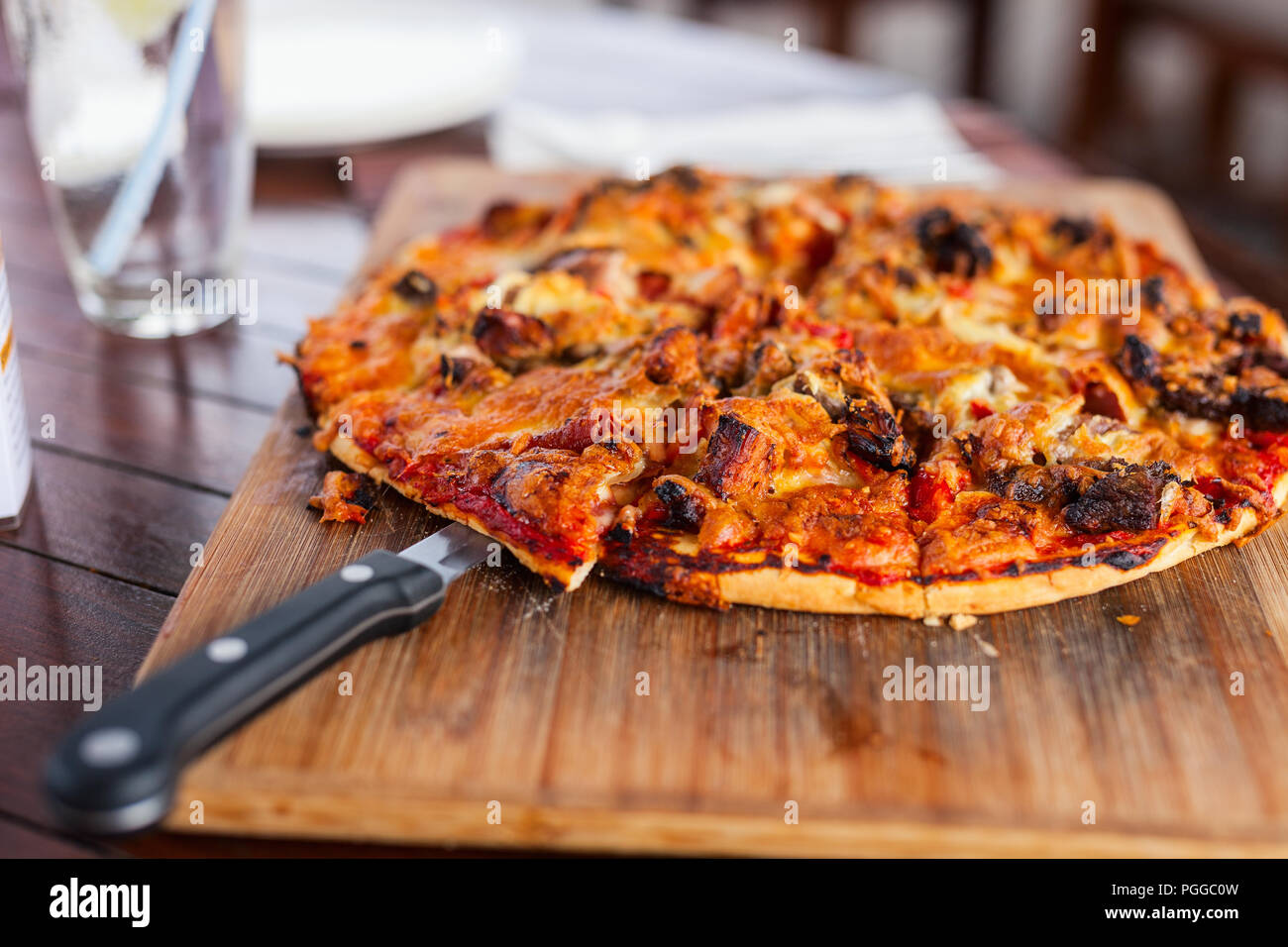 Delicious hot pizza served for lunch in restaurant Stock Photo - Alamy