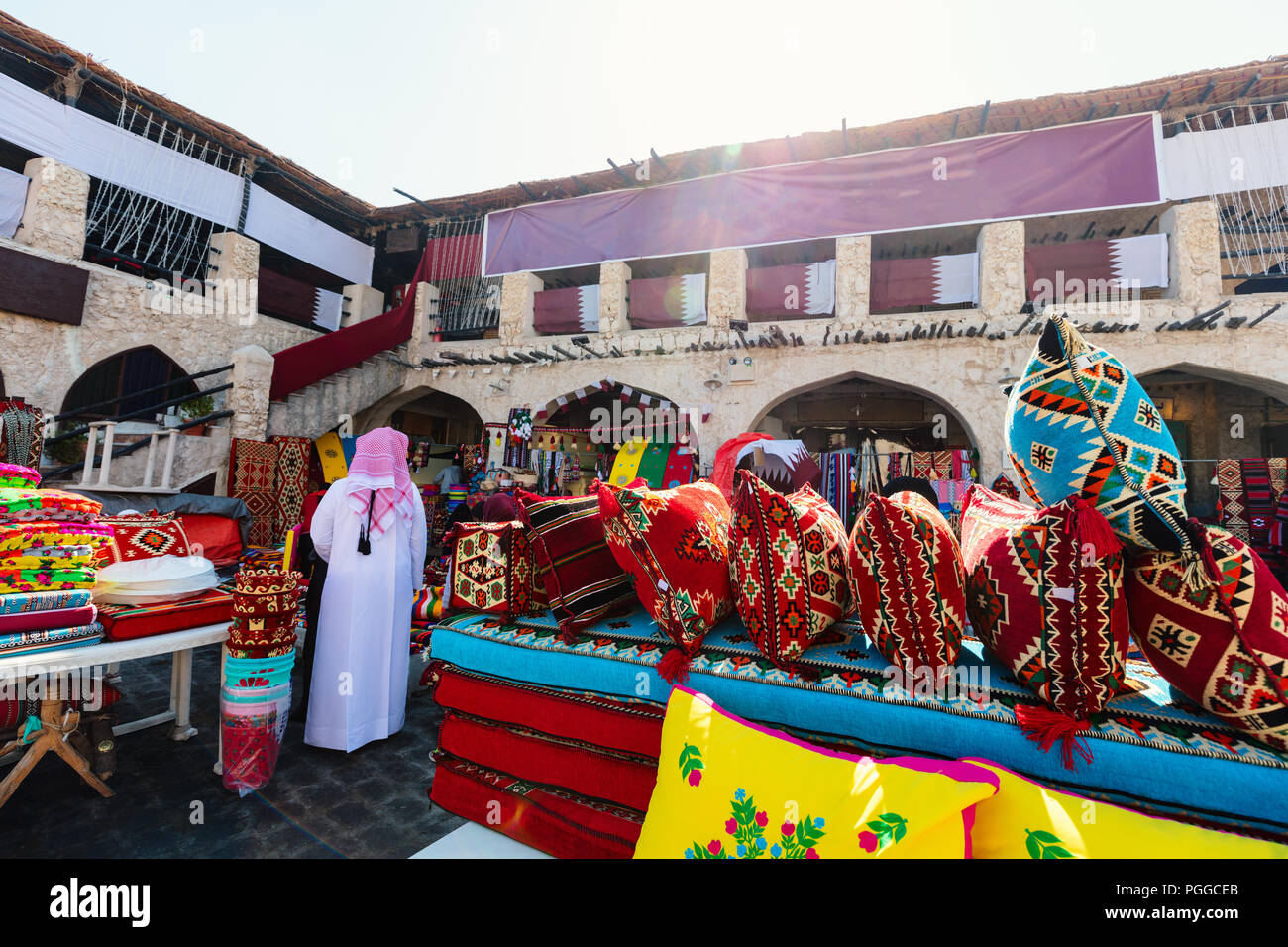 Carpets for sale at market in Doha Qatar Stock Photo - Alamy