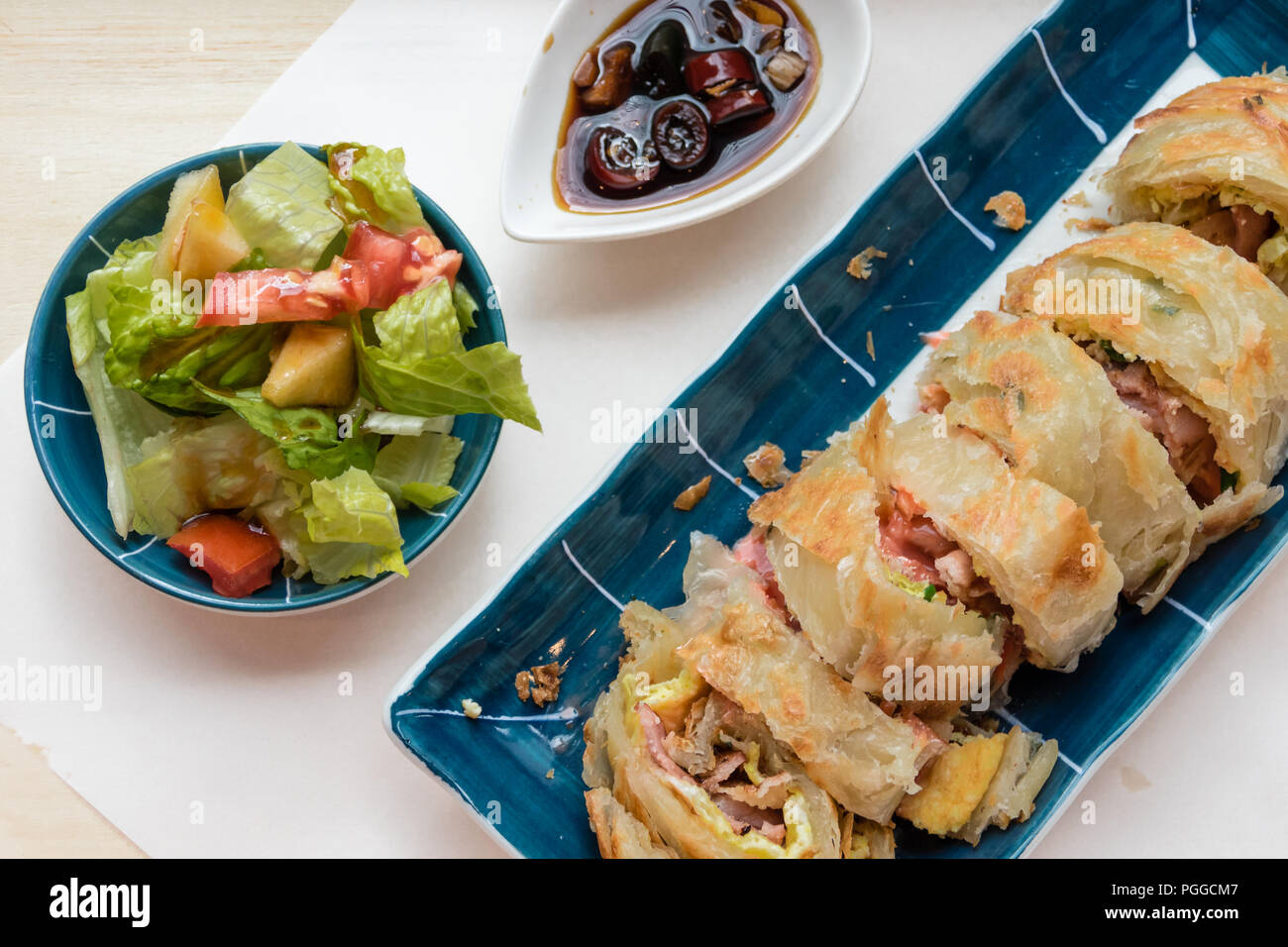 Traditional Chinese food, Taiwanese fried pancake with bacon and cheese ...