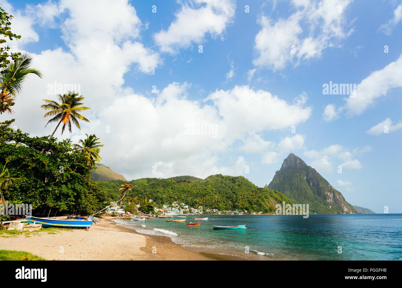 Idyllic white sand tropical beach with view to Piton mountains in Saint ...
