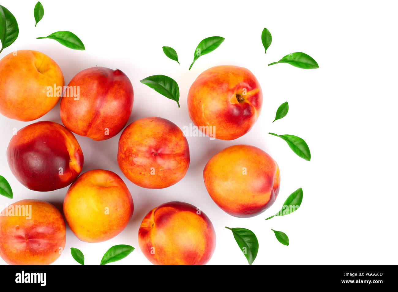 ripe nectarine with leaves isolated on white background with copy space ...