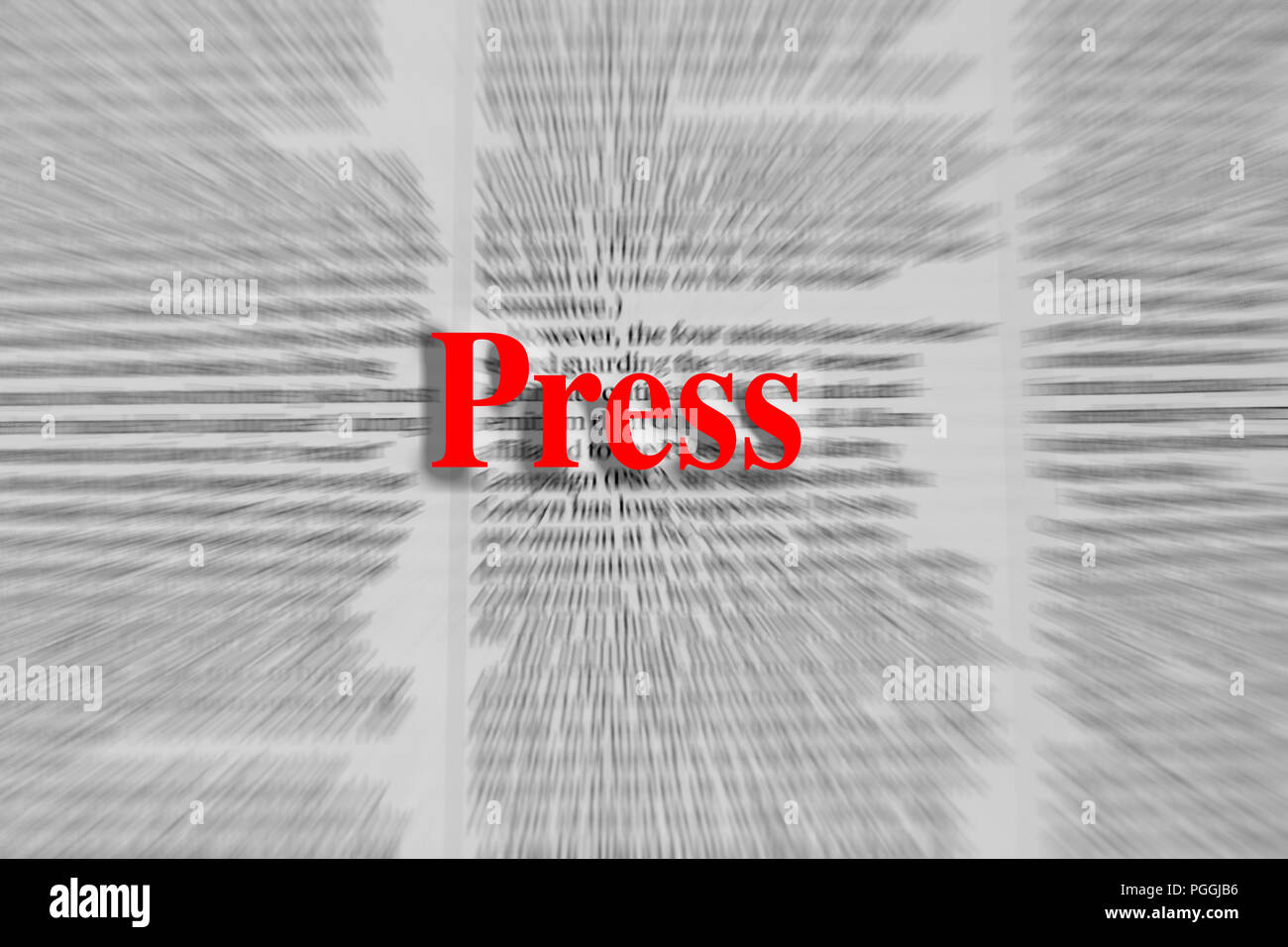 Press written in red with a newspaper article blurred in the background ...