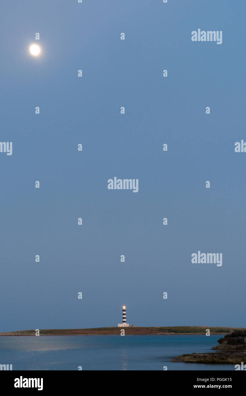 Illa de l'Aire Lighthouse, Punta Prima, Menorca, Spain, in moonlight ...
