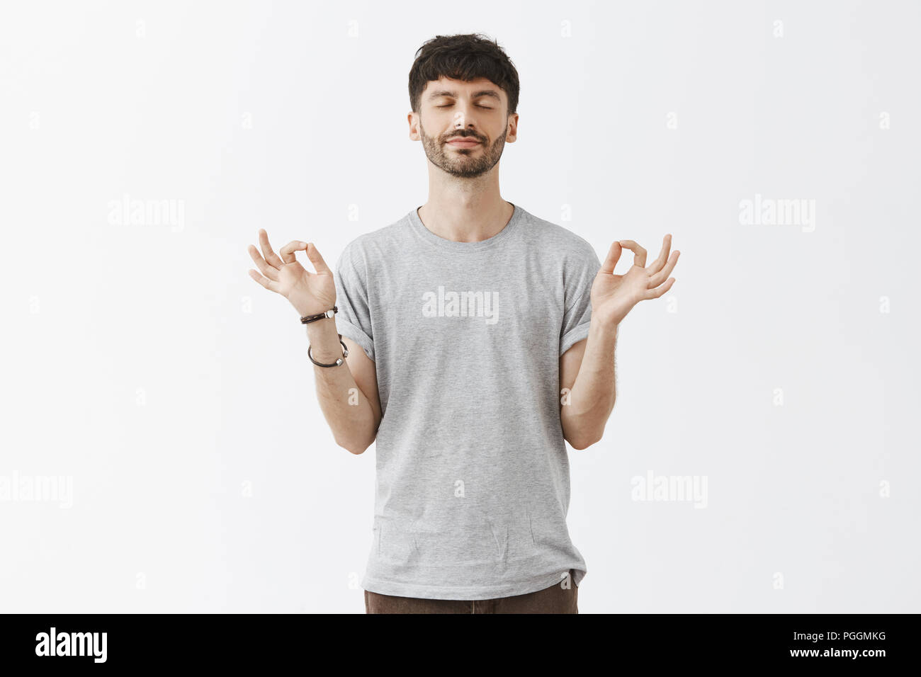 Pacience key to success. Calm and relaxed happy carefree handsome guy ...