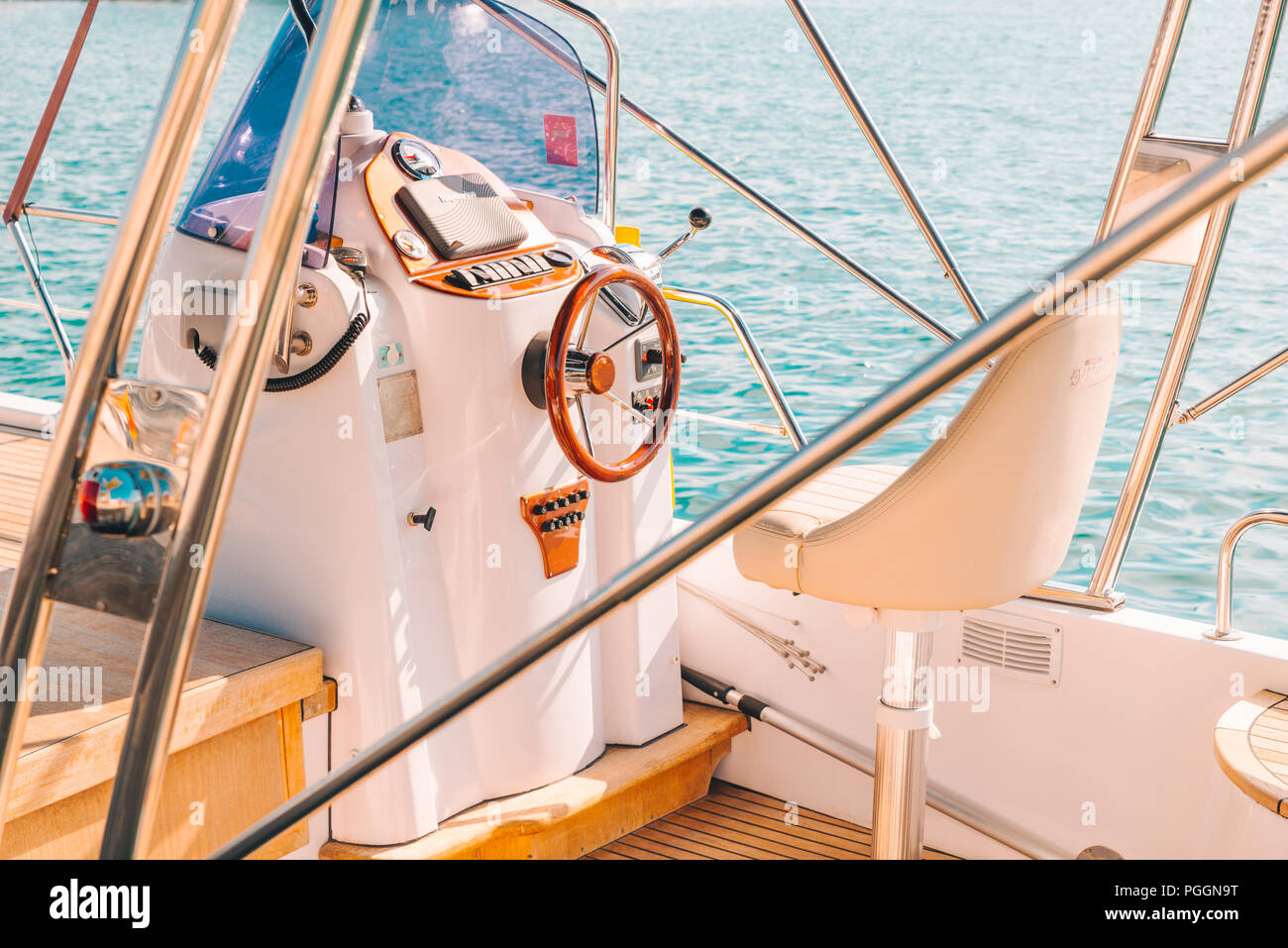 boat deck with steering wheel close up. summer time Stock Photo - Alamy