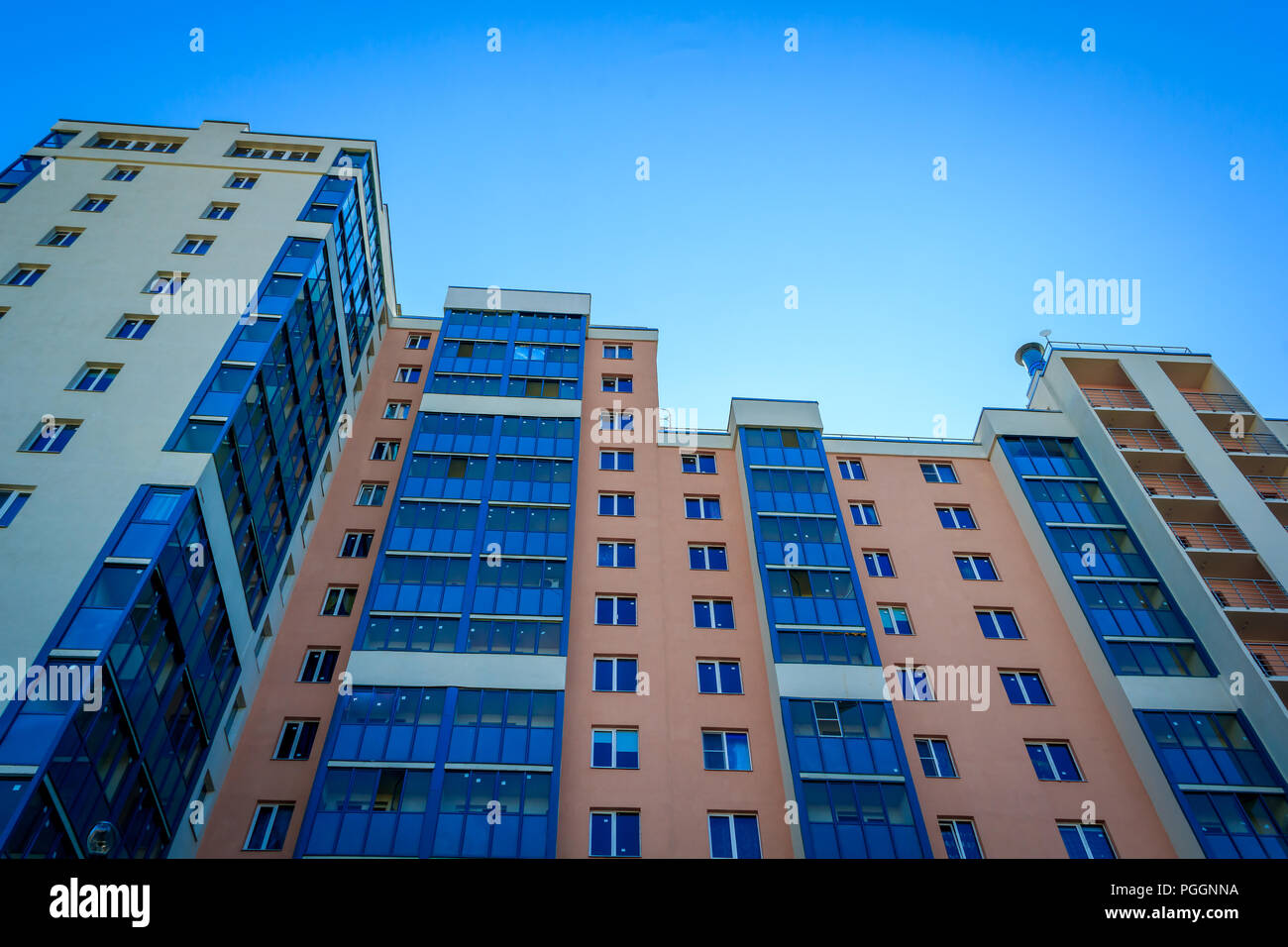 The windows of a high-rise multi-storey residential building. Buildings ...