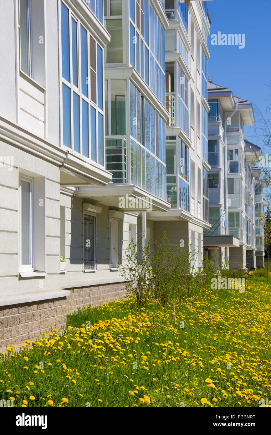 The windows of a high-rise multi-storey residential building. Buildings ...