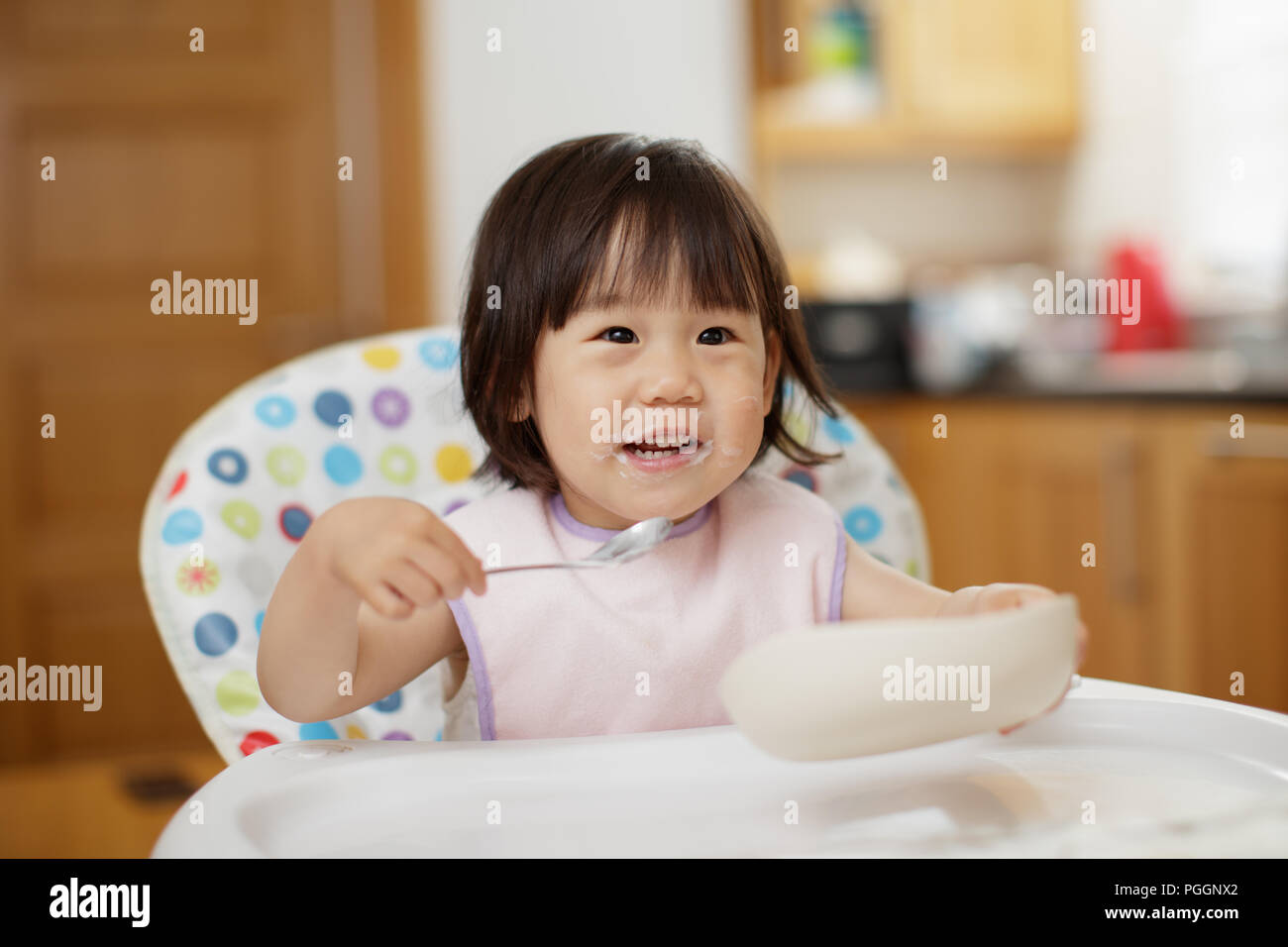 Child girl fruit yoghurt eat hi-res stock photography and images - Alamy