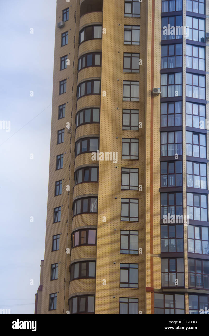 The windows of a high-rise multi-storey residential building. Buildings ...