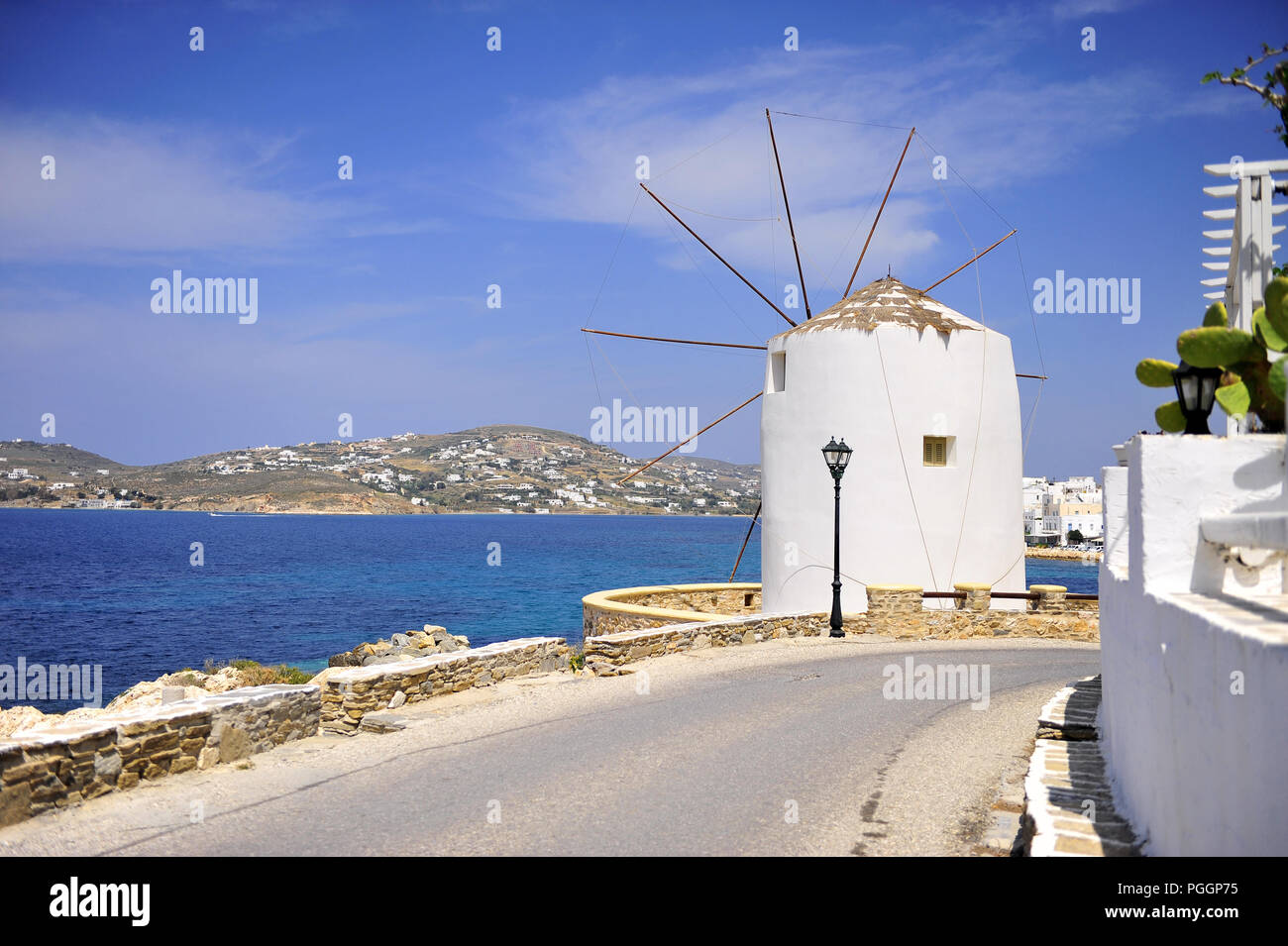 Beautiful white windmill in the street, Paros island, Greece Stock ...