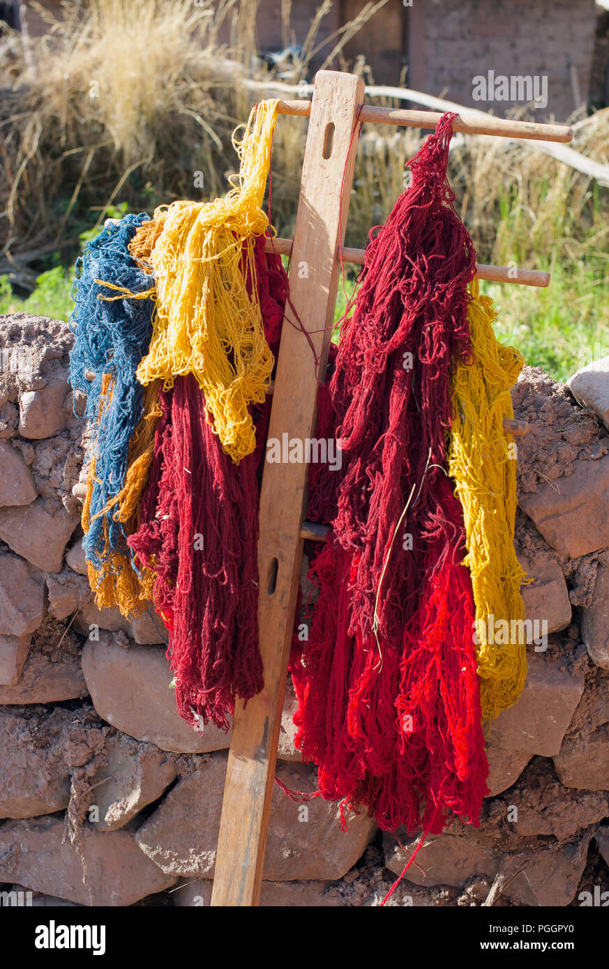 Traditional Dyed Wool in Many Colors Hanging from a Stand in Peru Stock ...