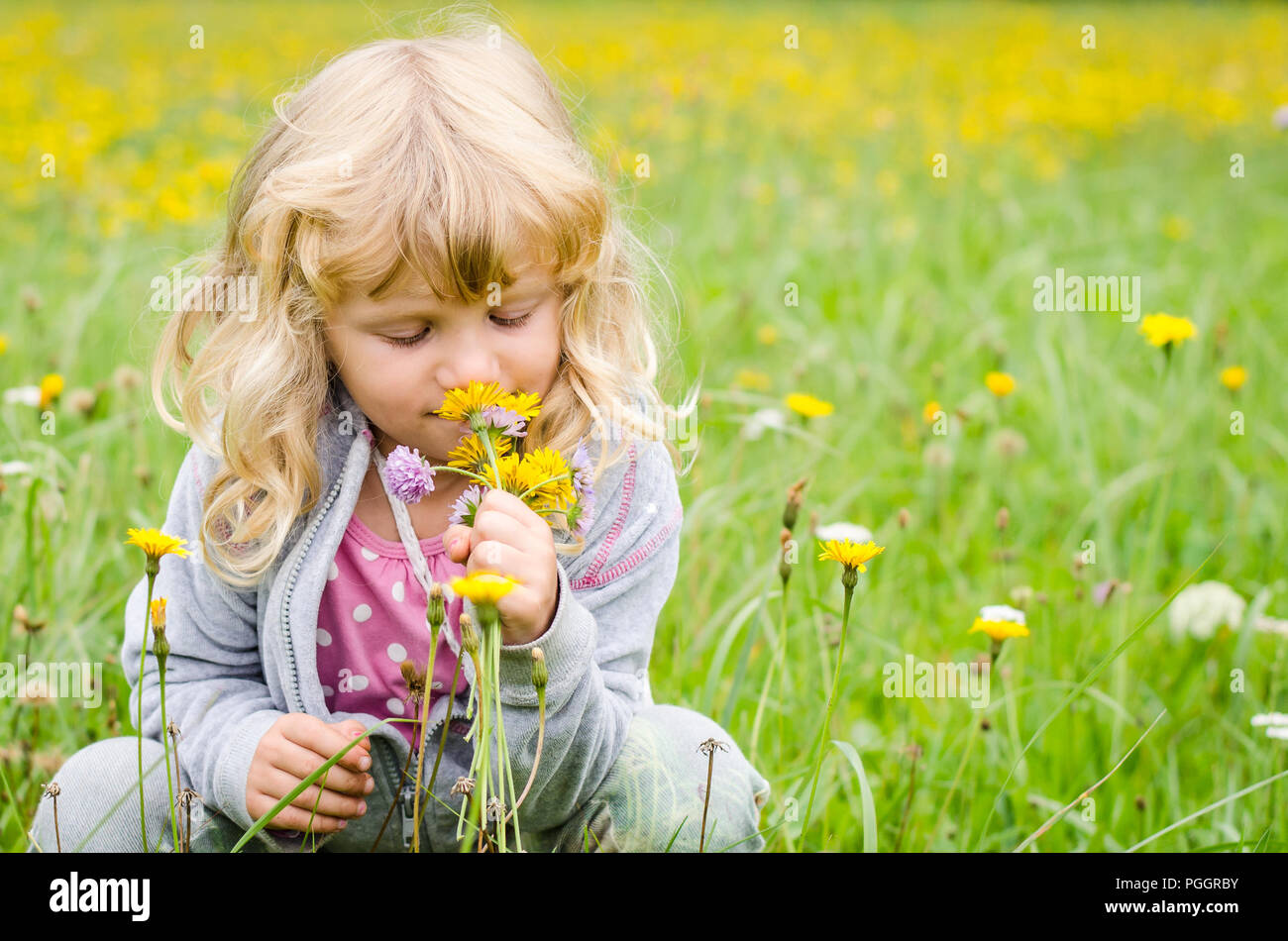 Happy girl hold yellow hi-res stock photography and images - Alamy