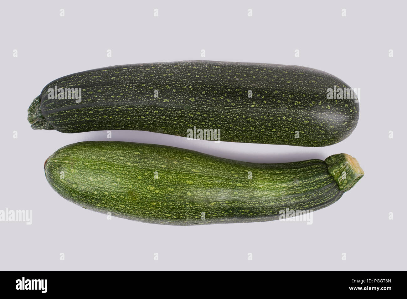 Isolated zucchini. Two fresh courgettes on white background Stock Photo ...