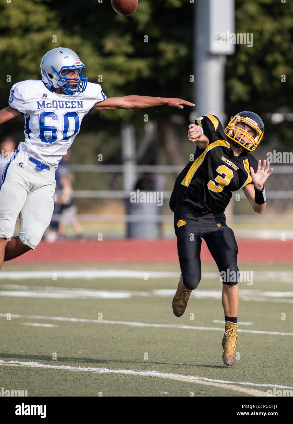 Football action with McQueen High School junior varsity at Enterprise ...