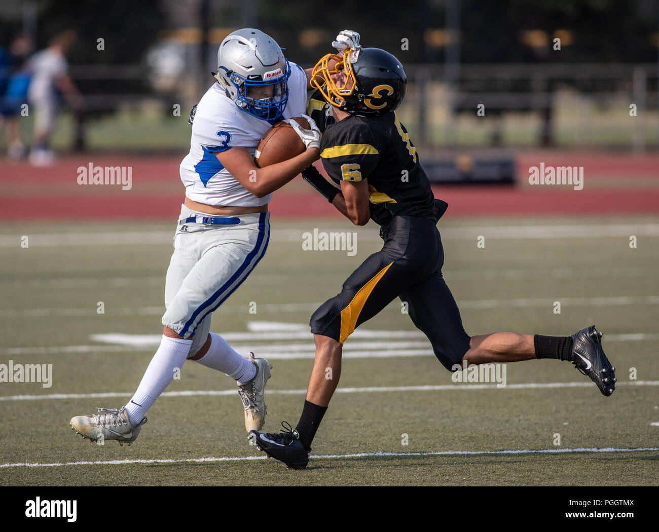 Football action with McQueen High School junior varsity at Enterprise ...