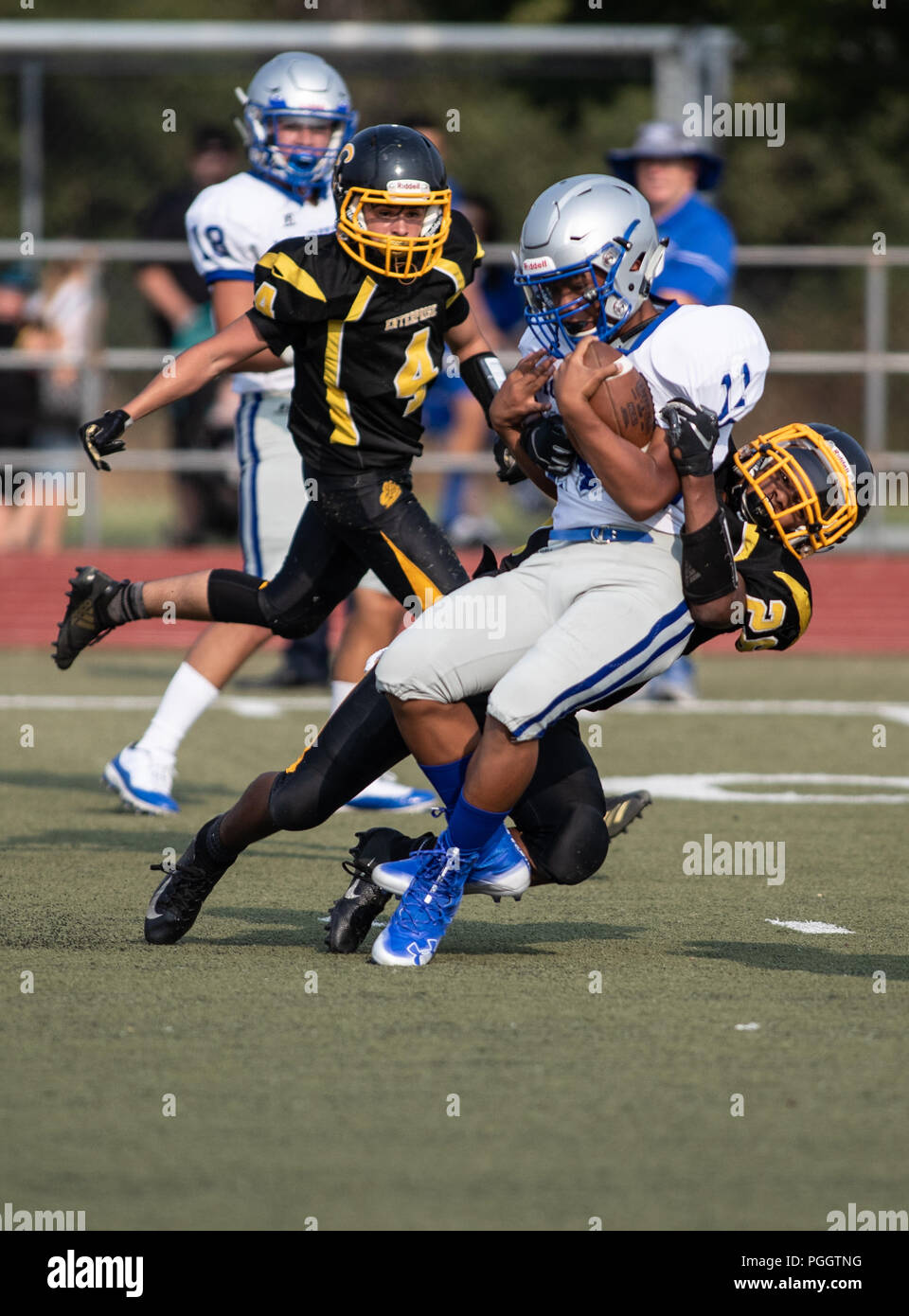 Football action with McQueen High School junior varsity at Enterprise ...