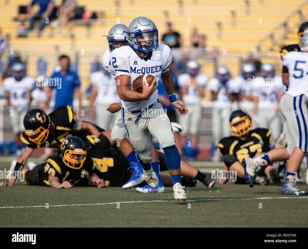 Football action with McQueen High School junior varsity at Enterprise ...