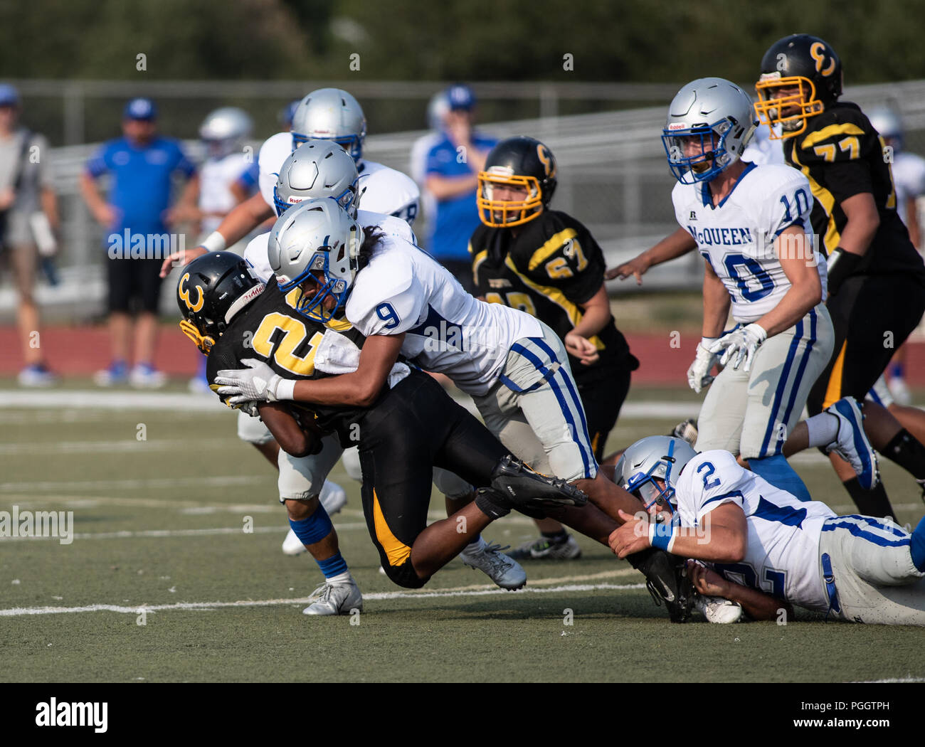 Football action with McQueen High School junior varsity at Enterprise ...