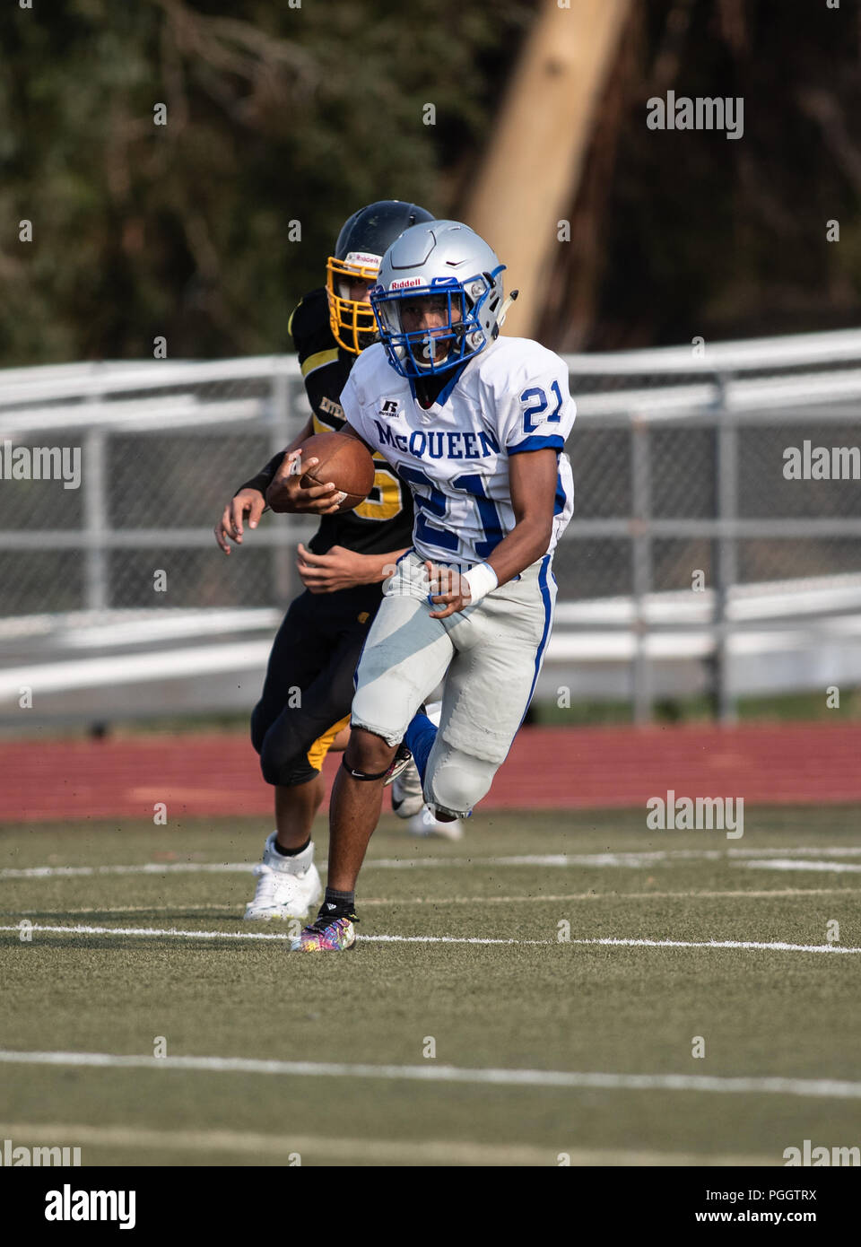 Football action with McQueen High School junior varsity at Enterprise ...