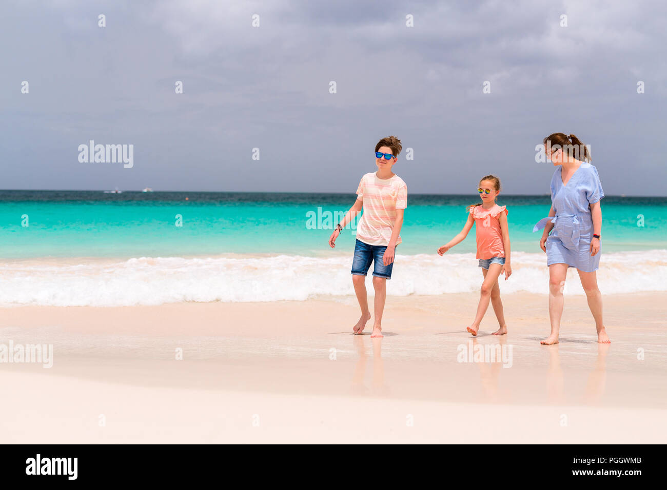Woman on beach in barbados hi-res stock photography and images - Alamy