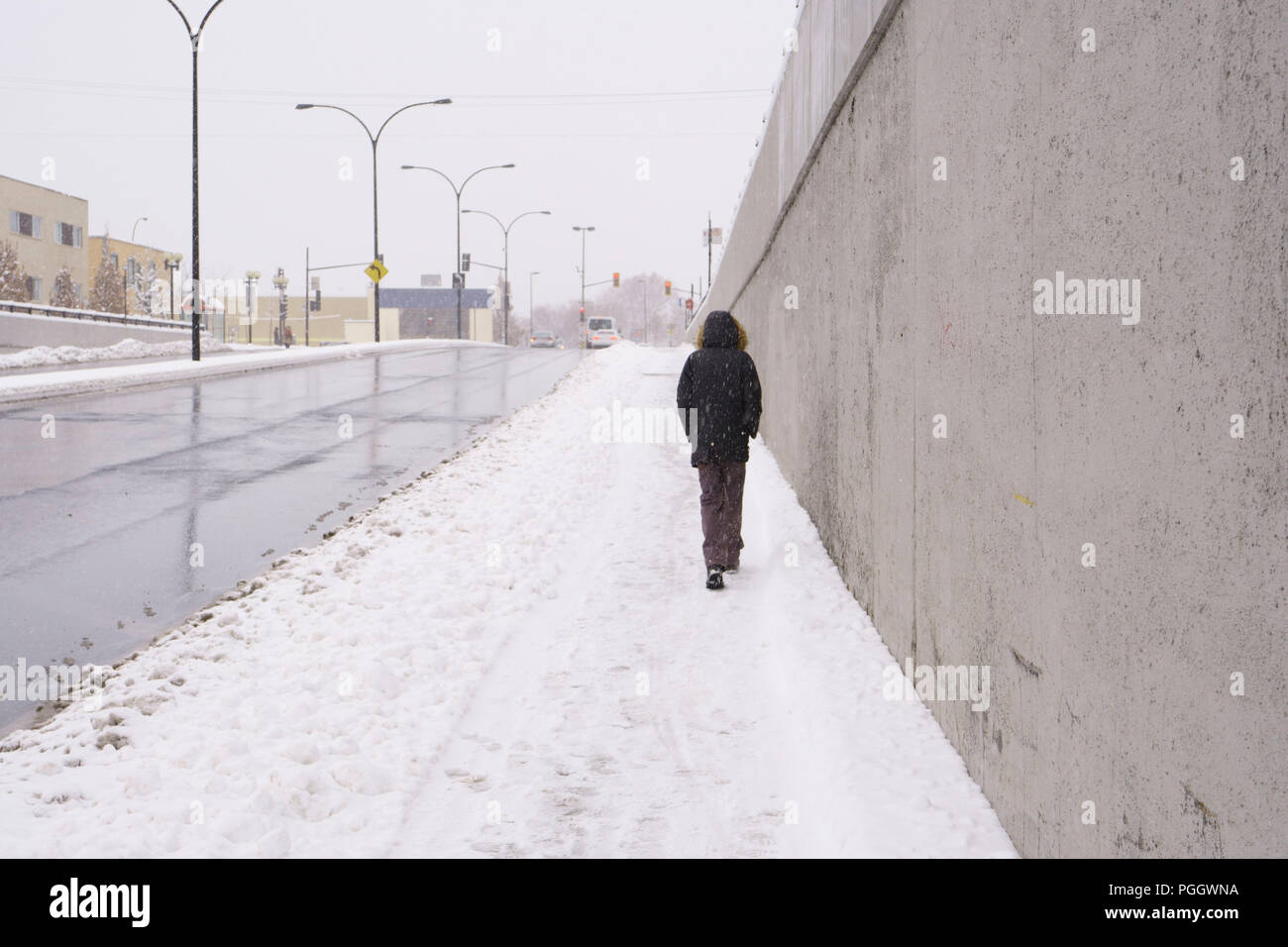 First snow of the year. An unknow young man or woman, alone, taken from ...