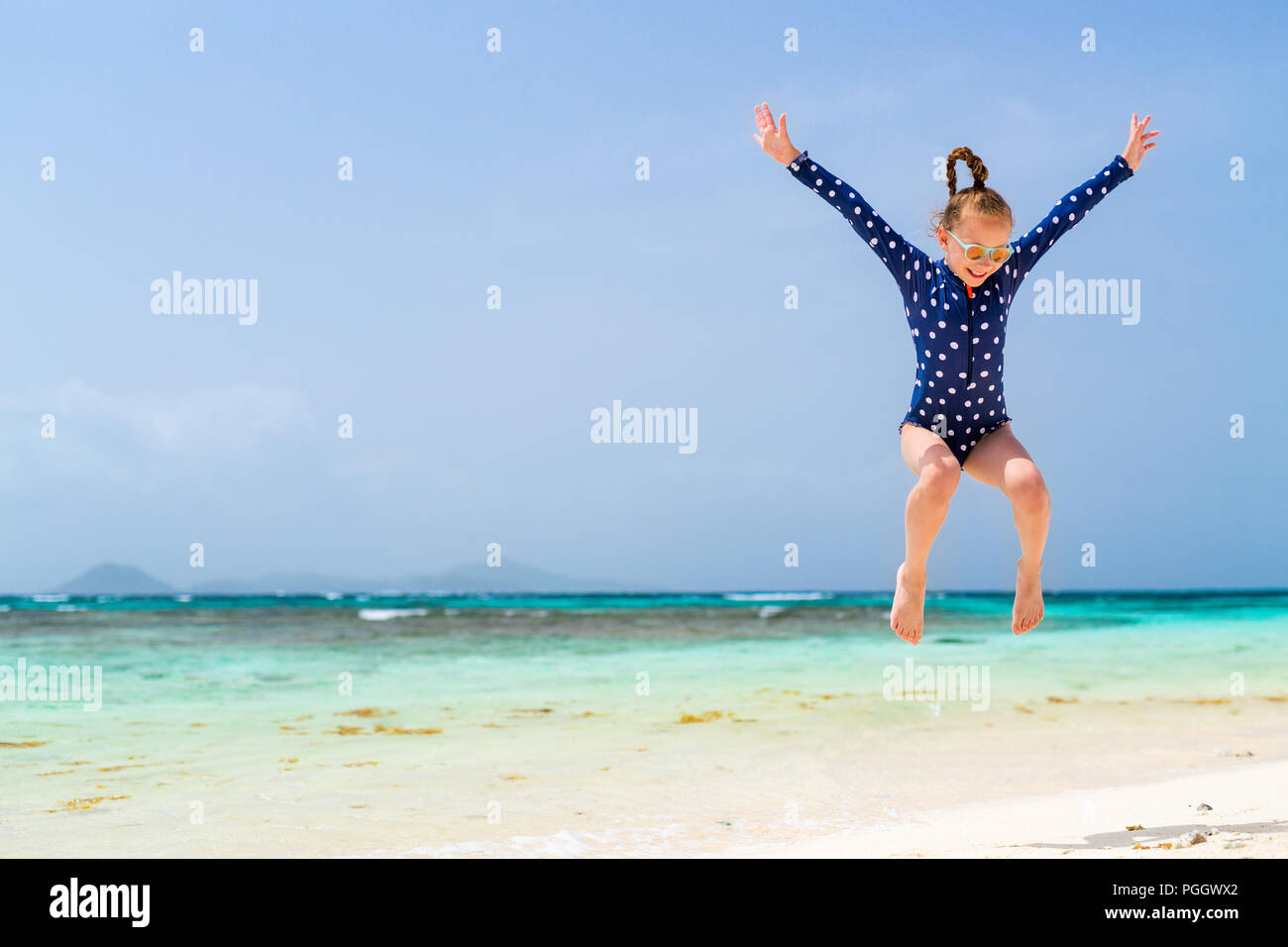 Adorable girl at beach during summer vacation Stock Photo - Alamy