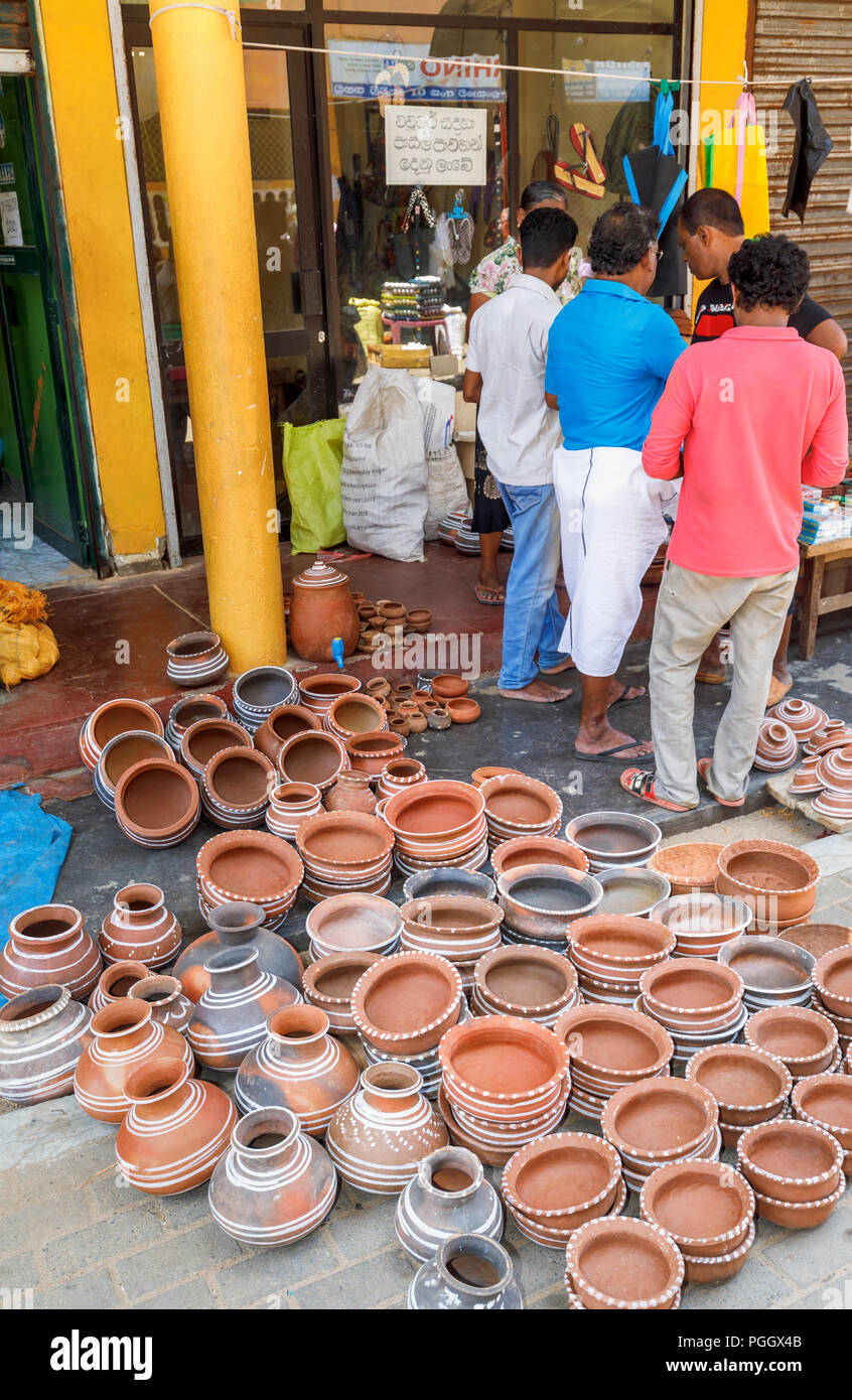 Ceramic pots, bowls and urns displayed outside a shop in the local ...