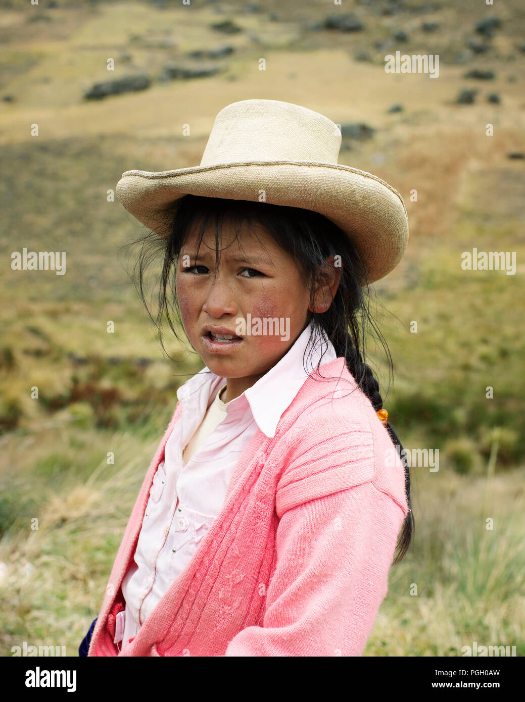 Close-up portrait of a native Peruvian girl in Cumbe Mayo archeological ...