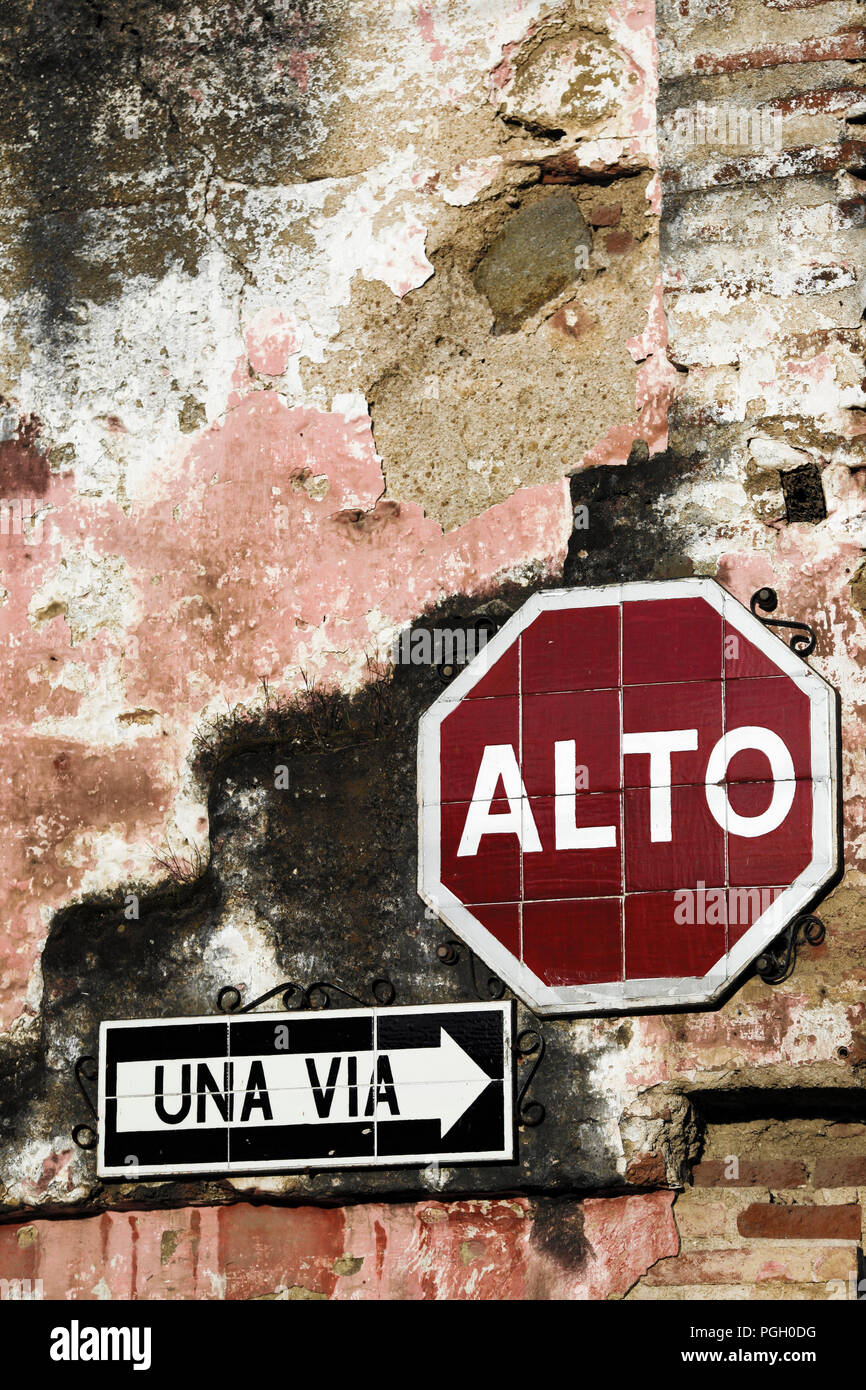 Stop sign on wall in Antigua Guatemala, Guatemala Stock Photo - Alamy