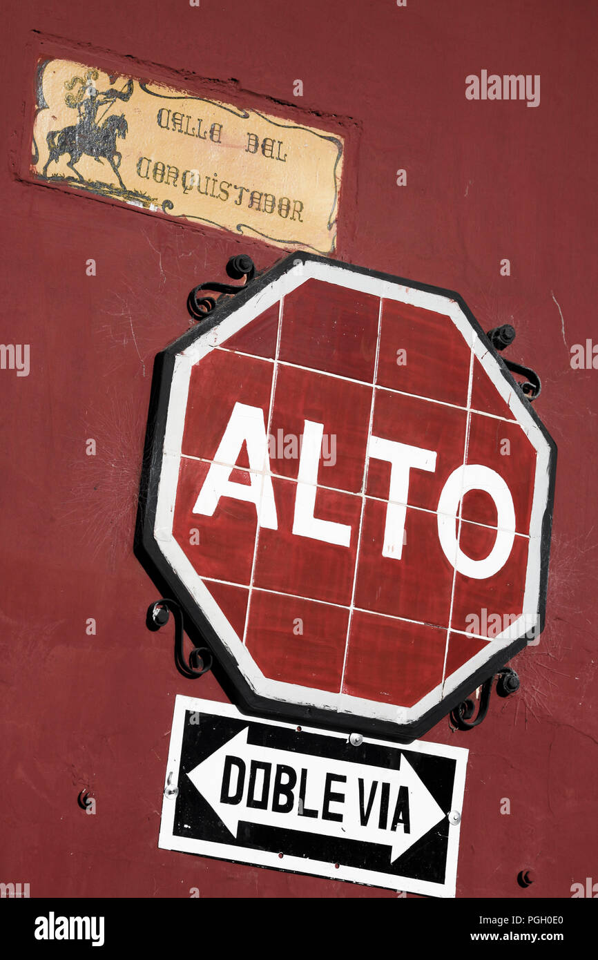 Stop sign on wall in Antigua Guatemala, Guatemala Stock Photo - Alamy