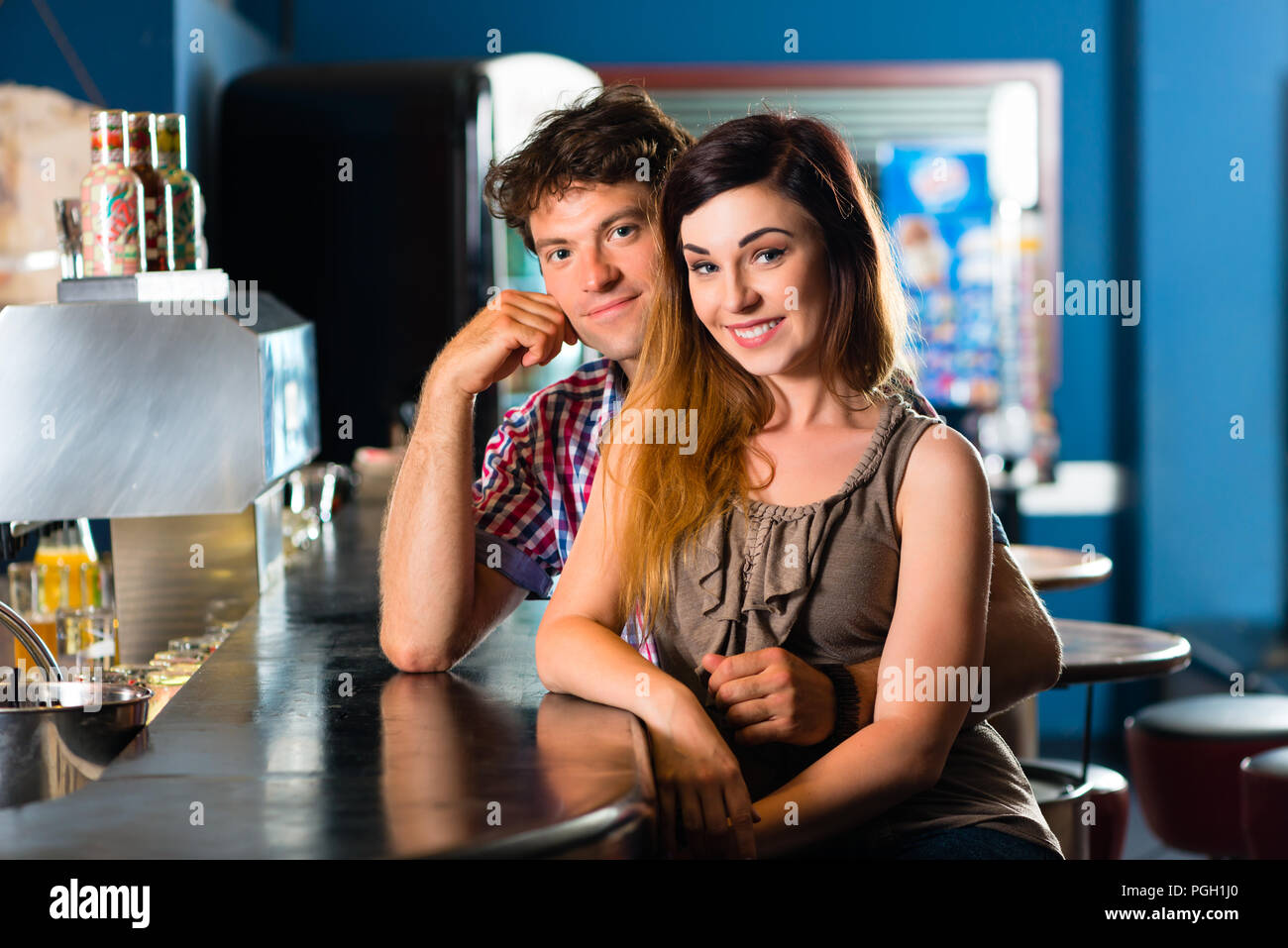 People in club or bar drinking Stock Photo - Alamy