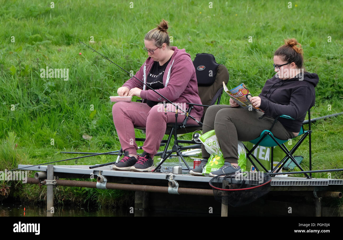 Women fishing hi-res stock photography and images - Alamy