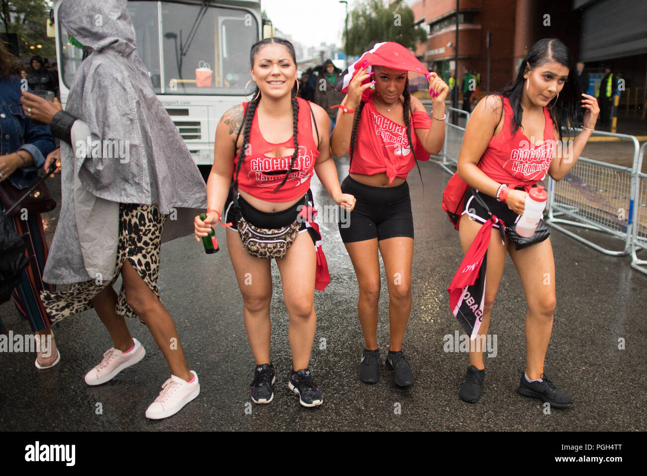 Participants in this year's Notting Hill Carnival brave heavy rain ...
