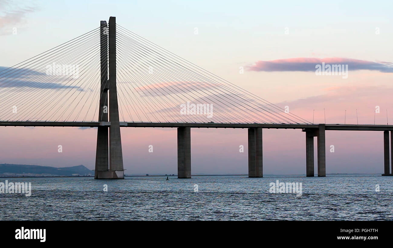 Cars crossing Bridge at dusk Stock Photo - Alamy