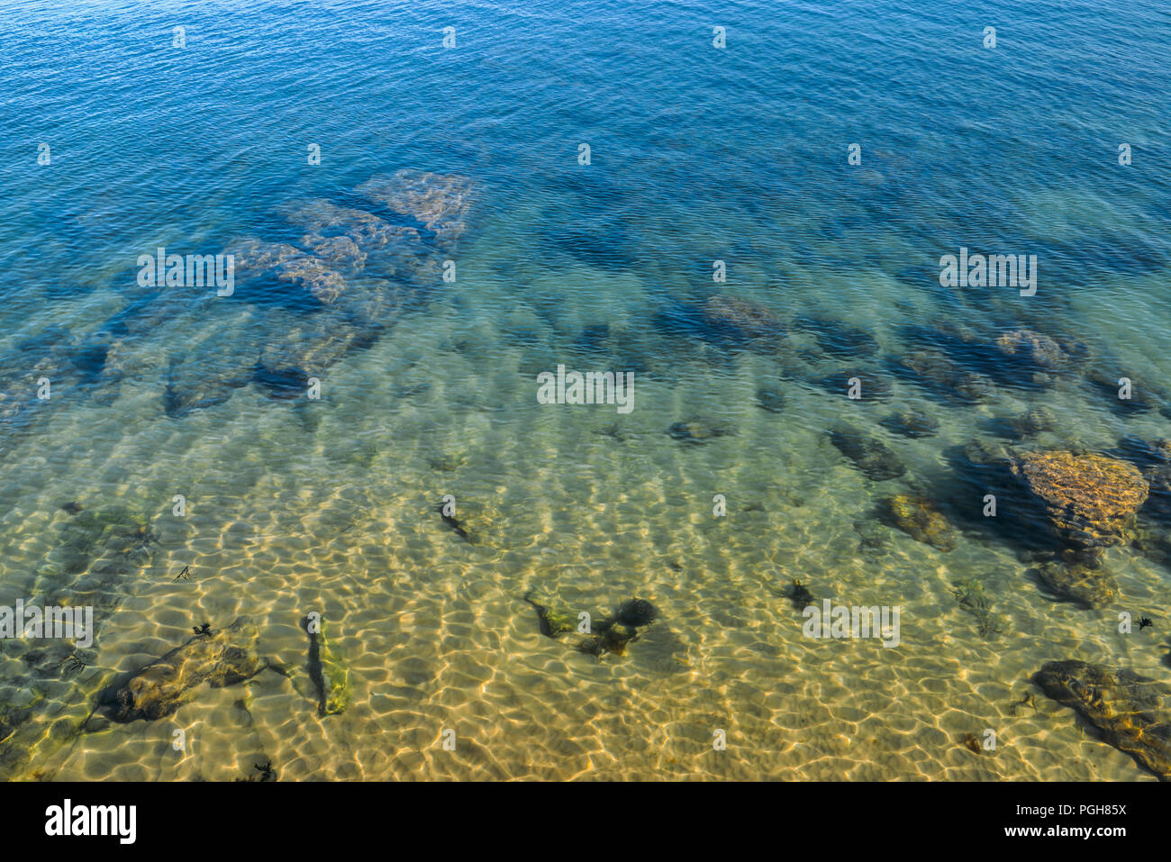 Deep blue lake with clean fresh water Stock Photo - Alamy