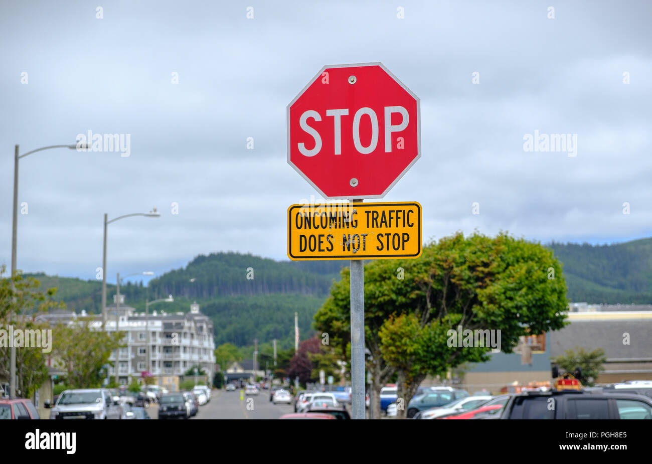 Stop sign "oncoming traffic does not stop" in Seaside, Oregon, USA ...