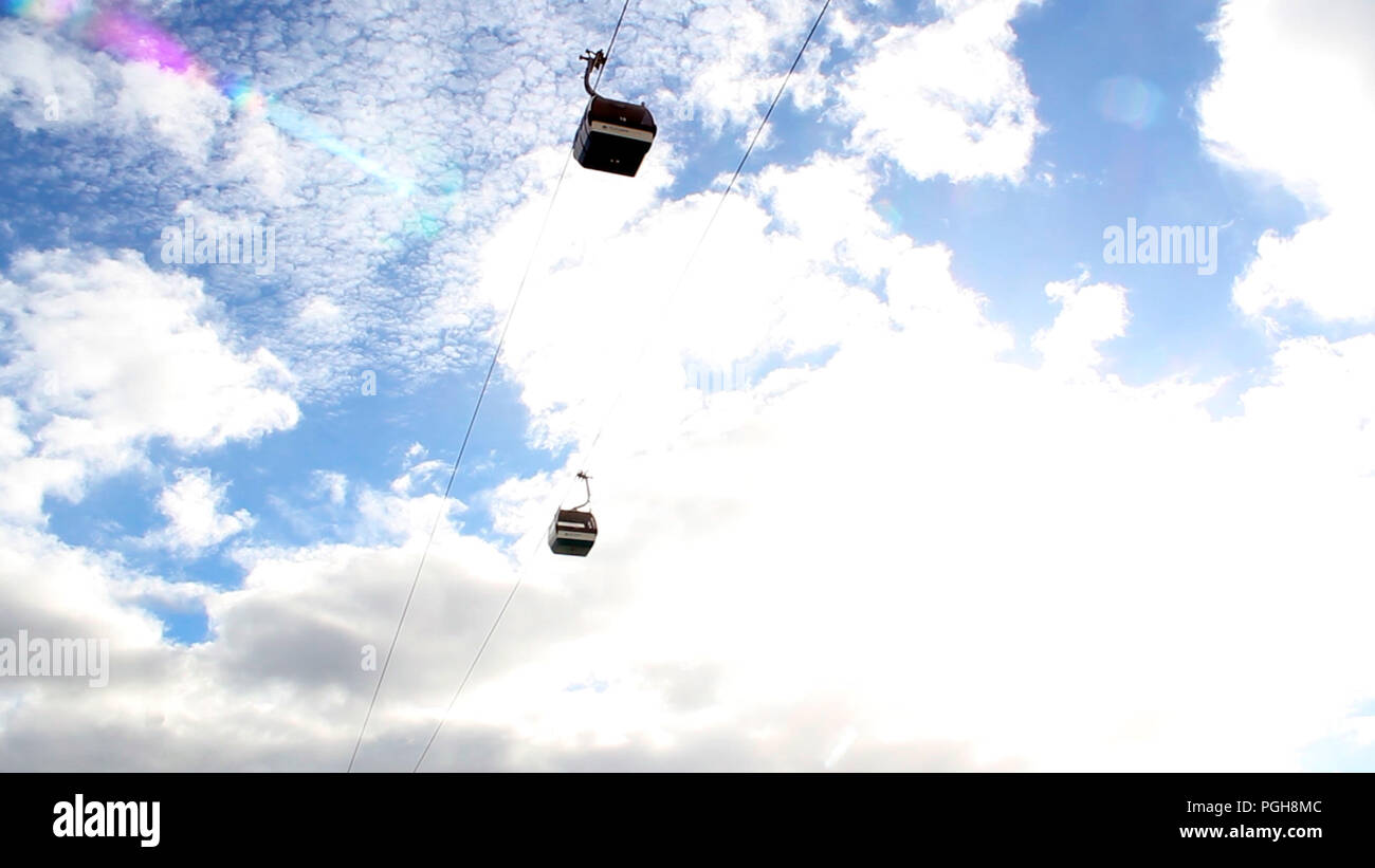Cable car crossing the sky Stock Photo - Alamy