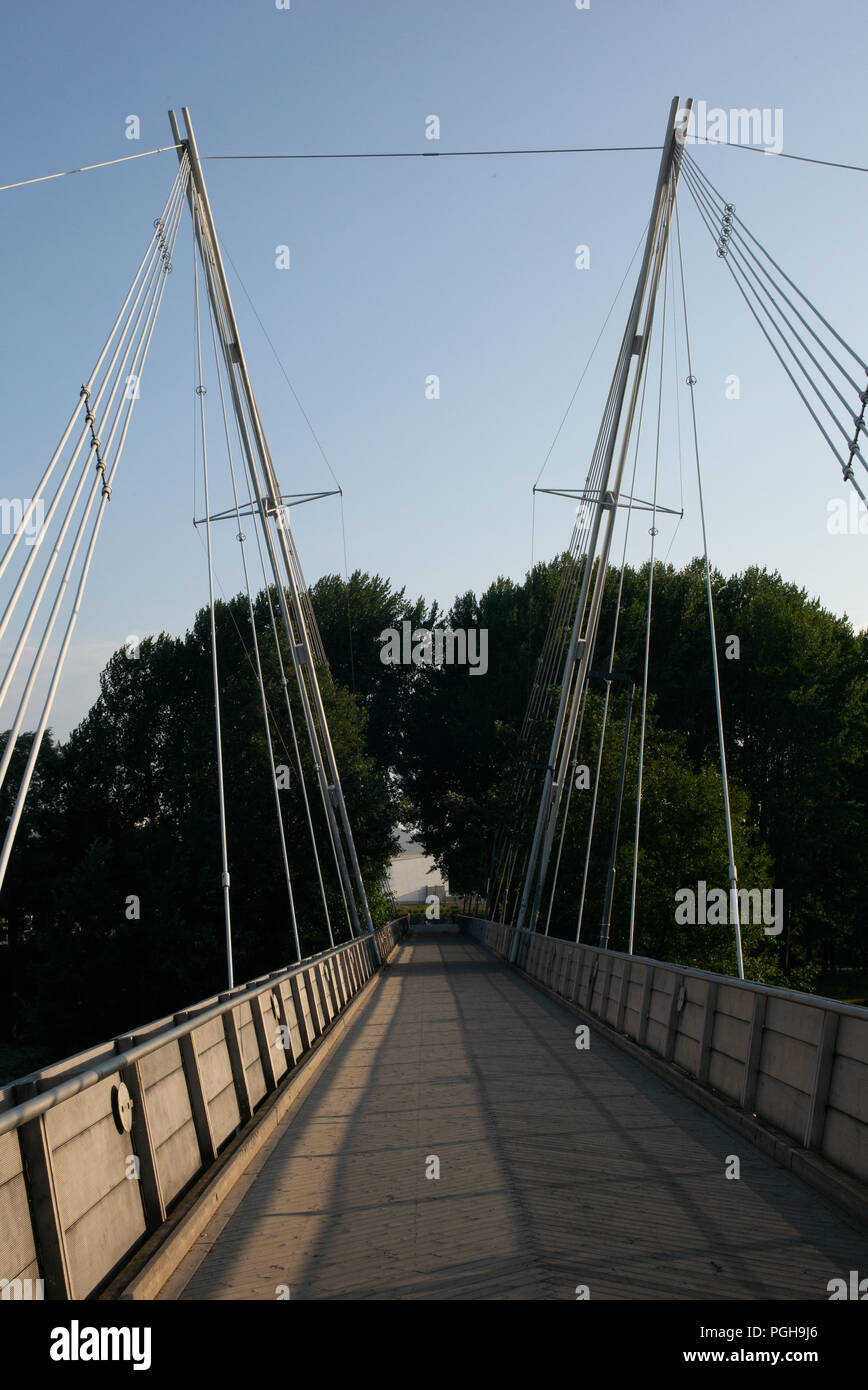 A quiet pedestrian bridge in Helsinki at sunset - 2 Stock Photo - Alamy