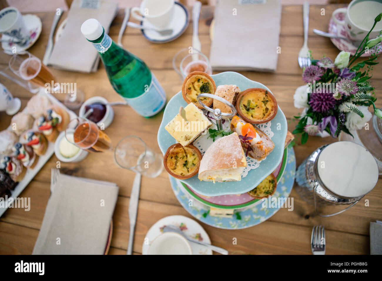 Cakes and scones laid out as if for a traditional afternoon tea party ...