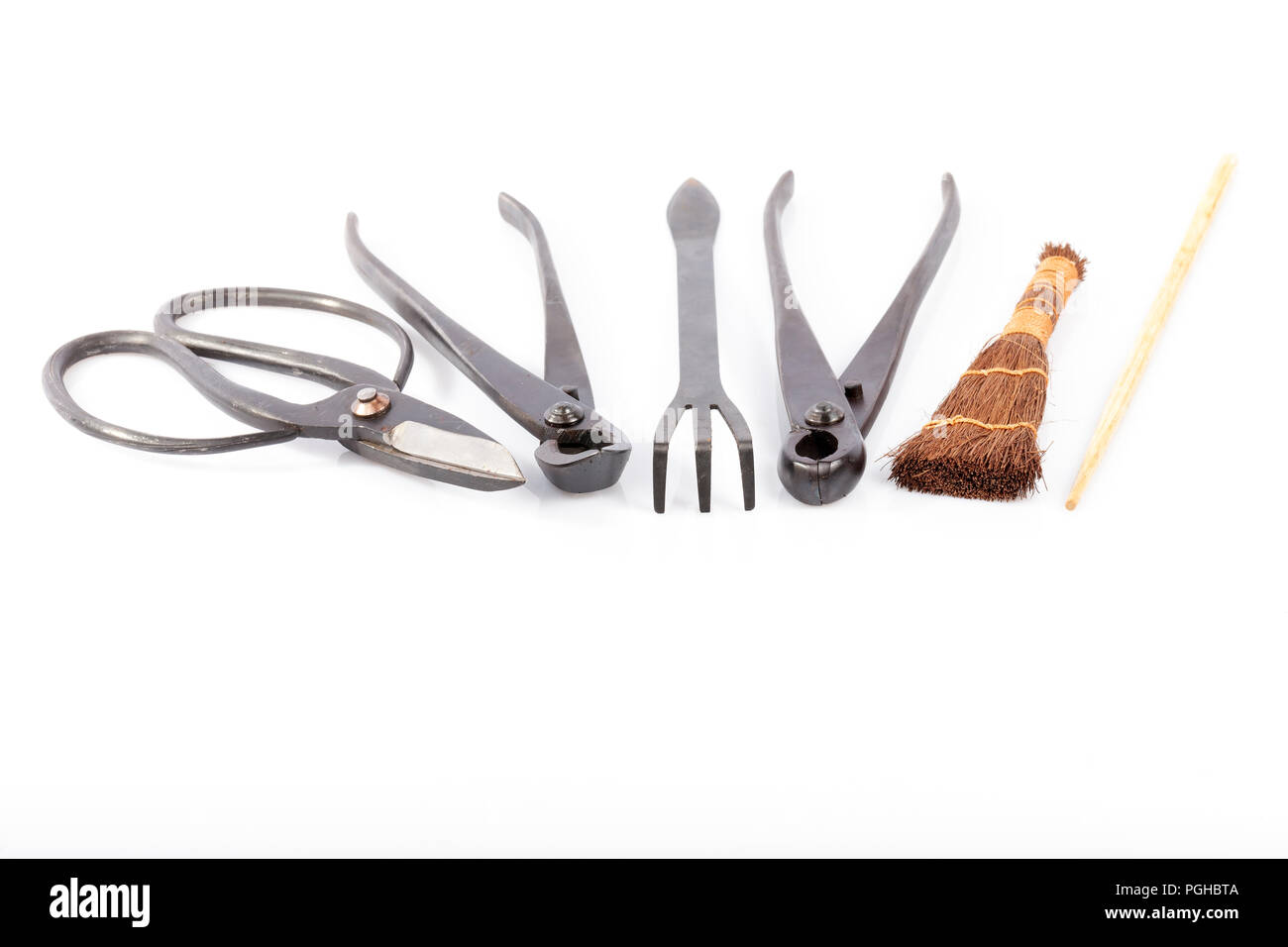Set of tools for cultivating bonsai isolated on white. Pruning shear ...
