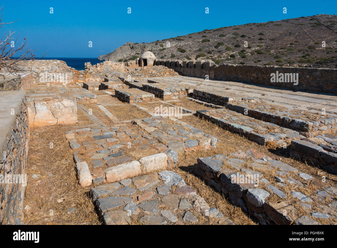 Lepers cemetery on Spinalonga island, Crete Stock Photo - Alamy