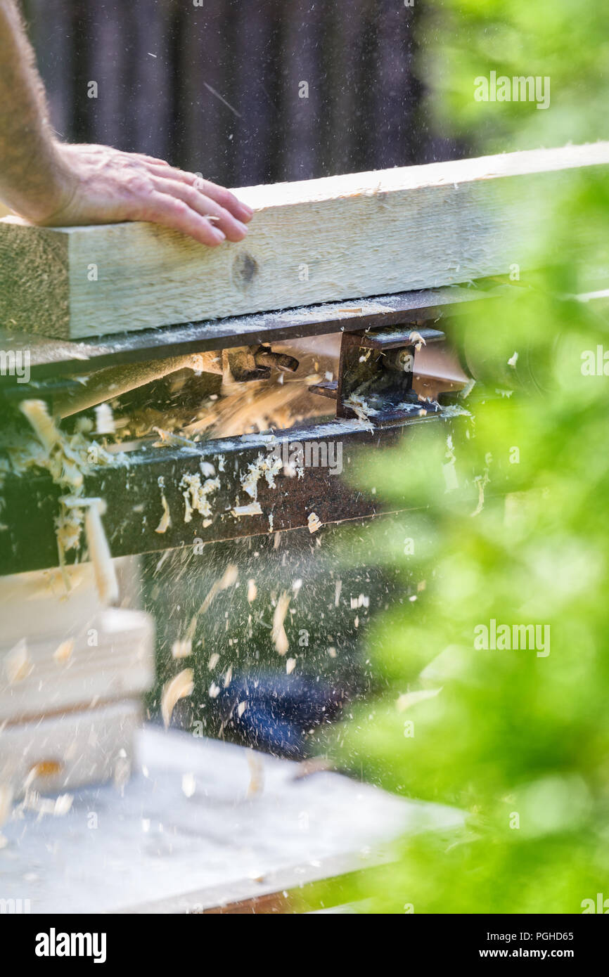 Man smoothing timber hi-res stock photography and images - Alamy